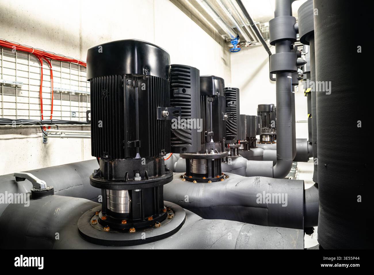 Interior of an industrial HVAC plant room featuring large insulated ...
