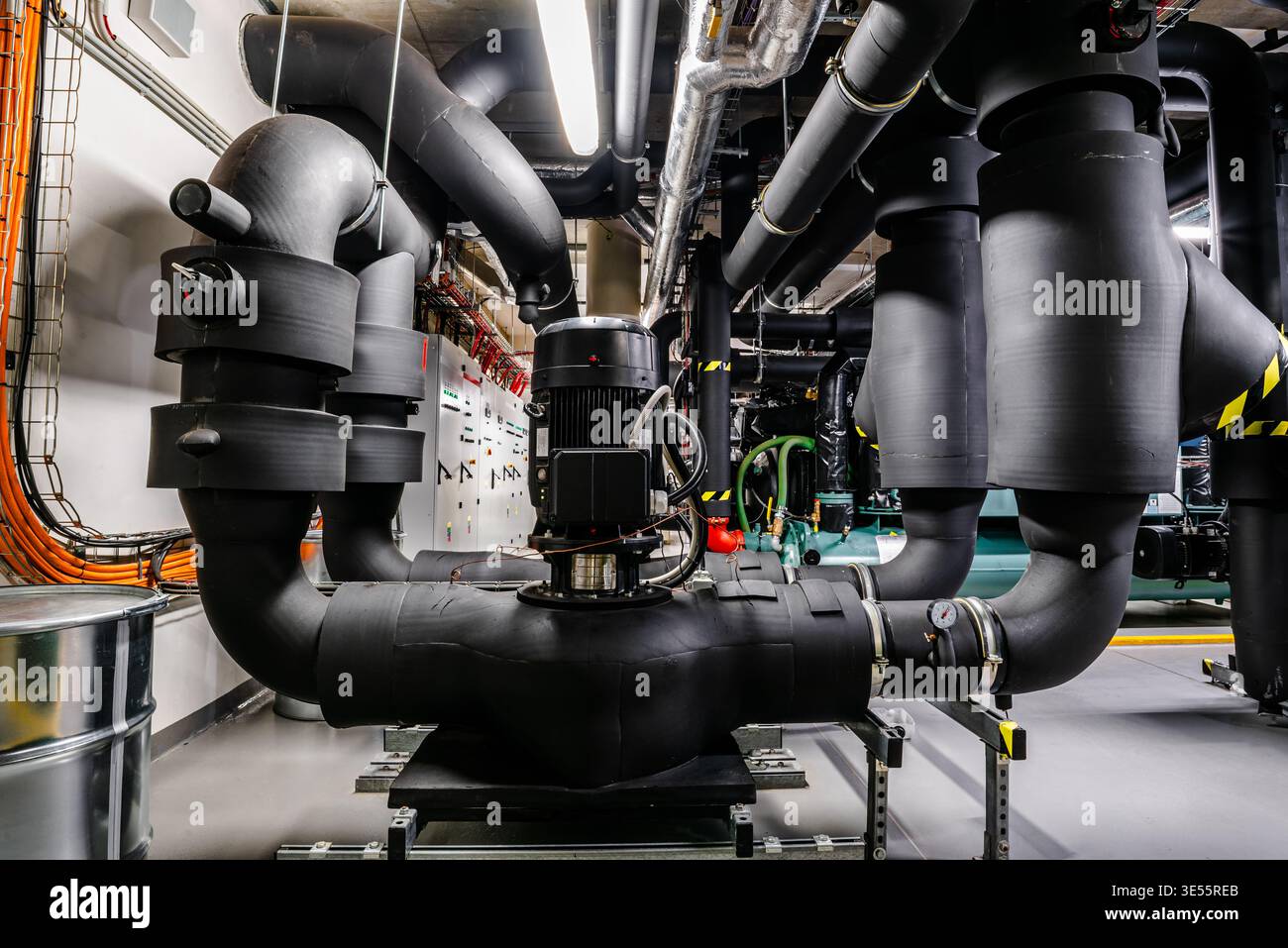 Interior of an industrial HVAC plant room featuring large insulated ...