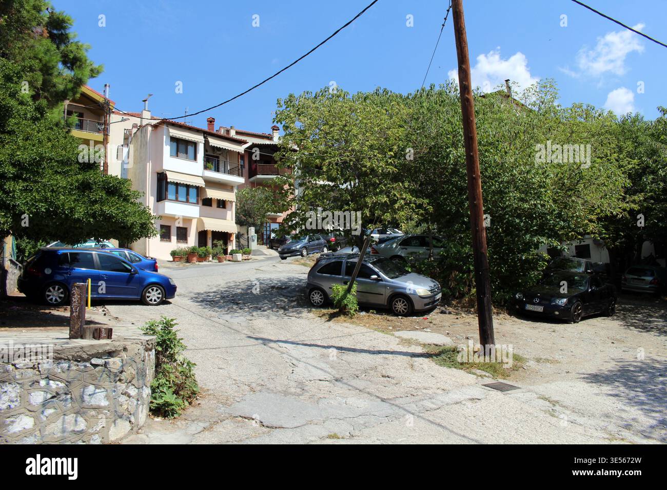 Ano Poli Street Parking Area August 2024 Traditional houses and parked ...