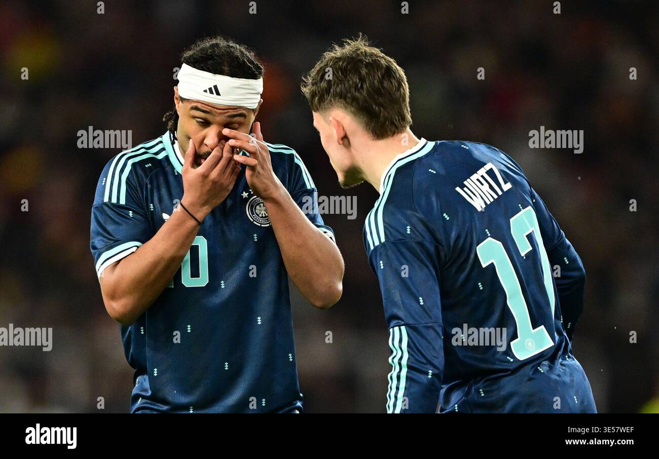 From left: Serge Gnabry has something in his eye, Florian Wirtz ...