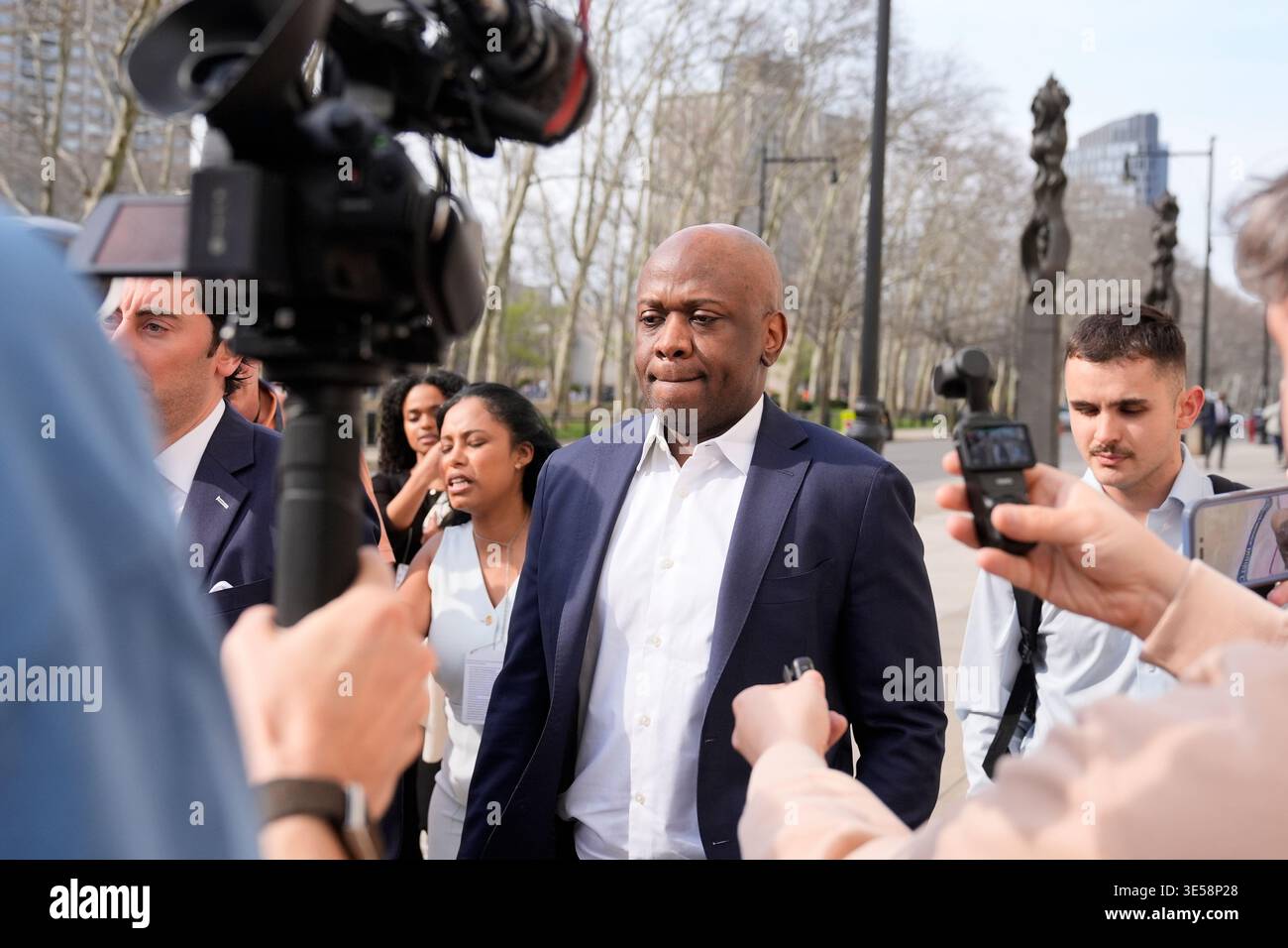 Roberto Samedy leaves a courthouse, in New York, Tuesday, March 31 ...