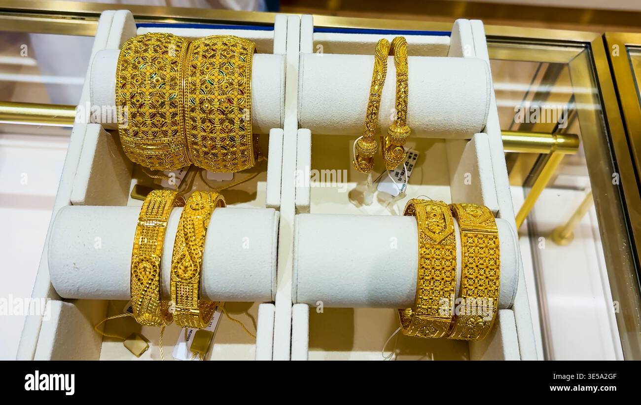 traditional indian gold bangles display in jewelry store showcase Stock ...