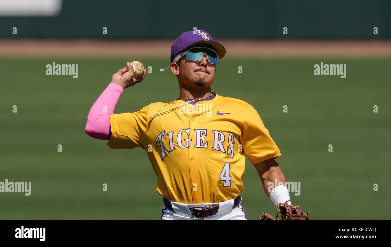 LSU infielder Steven Milam (4) throws during an NCAA baseball game on ...