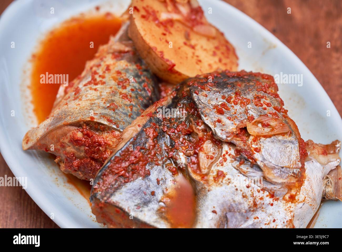 Classic Korean mackerel dishes. Showcases the spicy, vibrant red of a ...