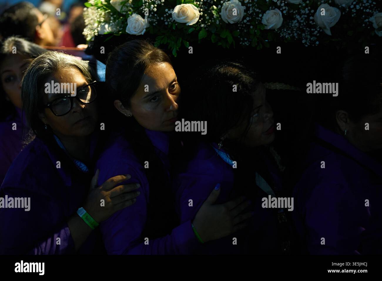 Faithful carry a float with a statue of the Virgin Mary during a ...