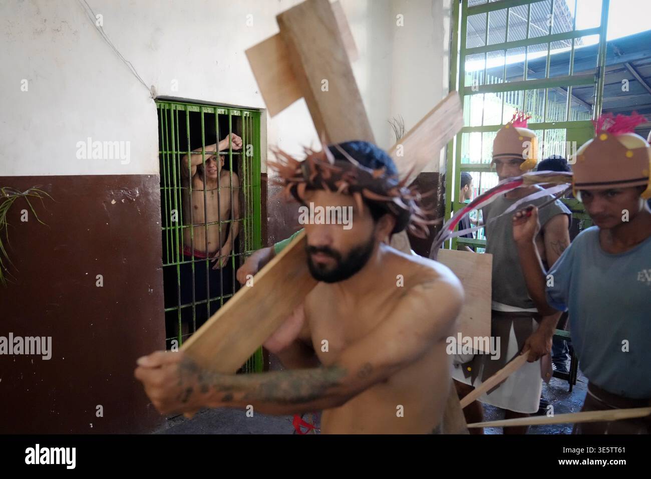 Inmates perform a Stations of the Cross reenactment at Tacumbu prison ...
