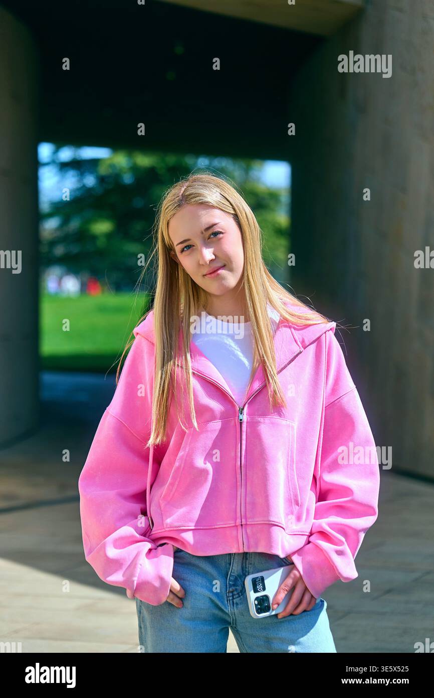 girl walks through a spring park with flowering trees Stock Photo - Alamy
