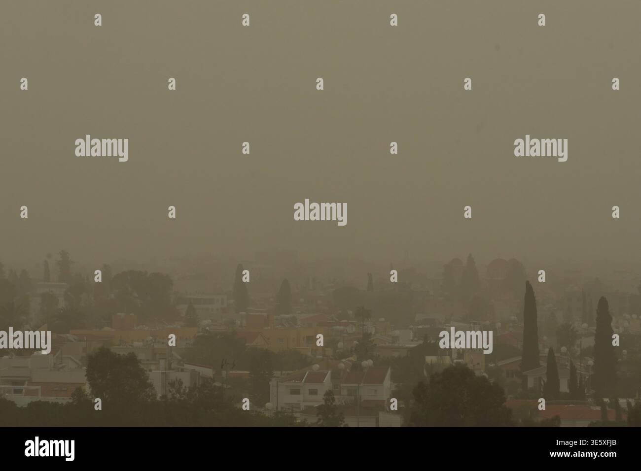 A haze caused by dust covers the capital Nicosia, in the southeast ...