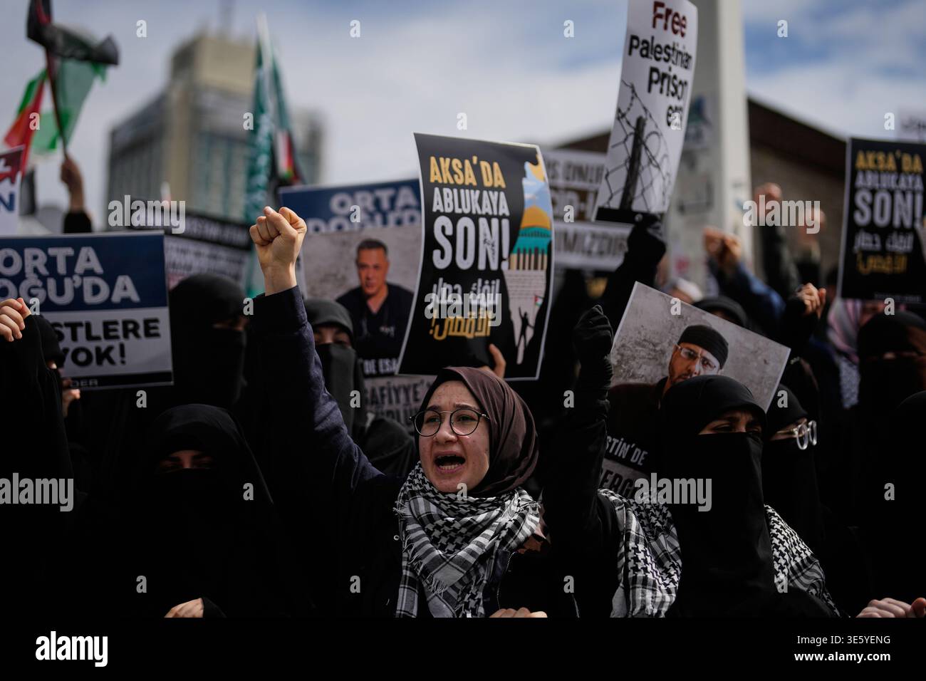 People chant slogans during a pro-Palestinian protest in Istanbul ...