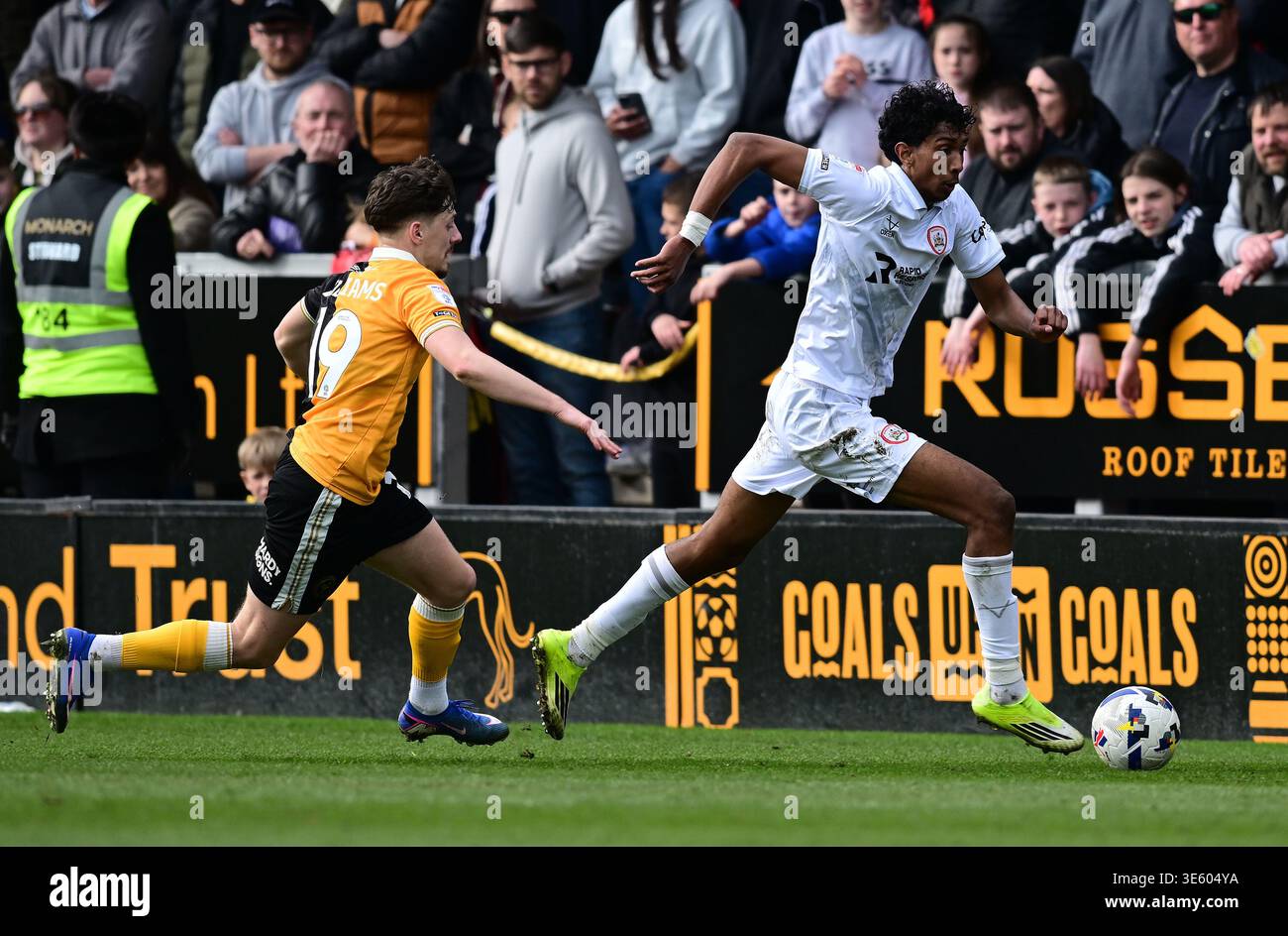 Barnsley's Vimal Yoganathan dribbles with the ball in the match between ...