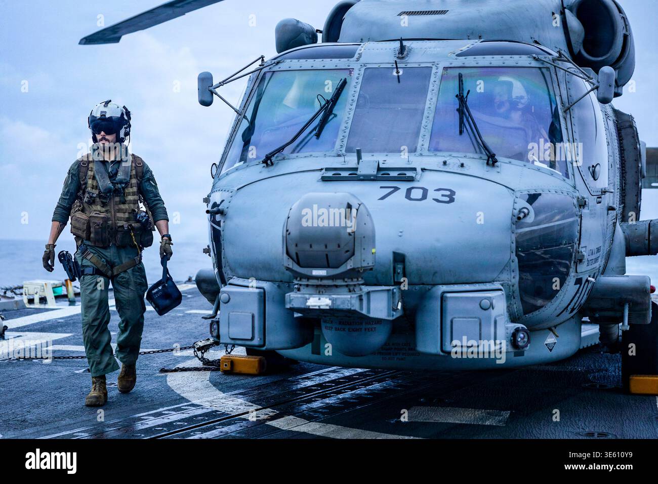 A U.S. Sailor, assigned to Helicopter Maritime Strike Squadron (HSM) 46 ...