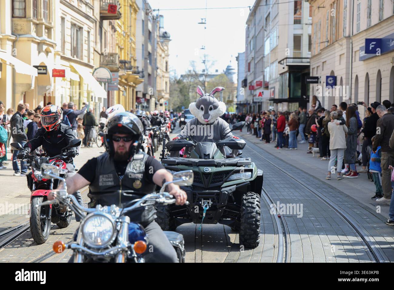 People dressed as the Easter Bunnies ride motorbikes during Easter Moto ...
