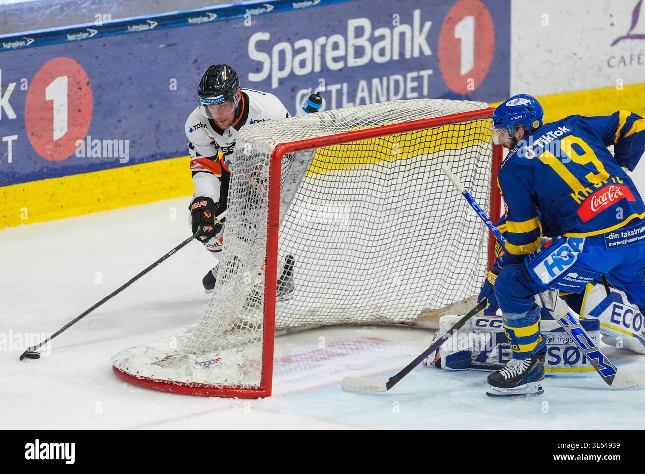 Hamar 20260404. Frisk Asker's Fredrik Bjørndal and Storhamar's Amil ...