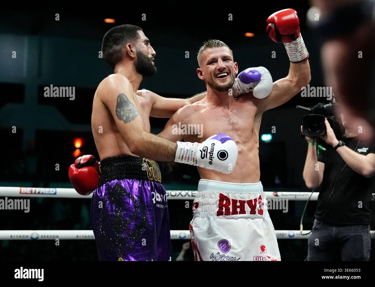 Rhys Edwards (right) and Gully Powar embrace after their vacant British ...