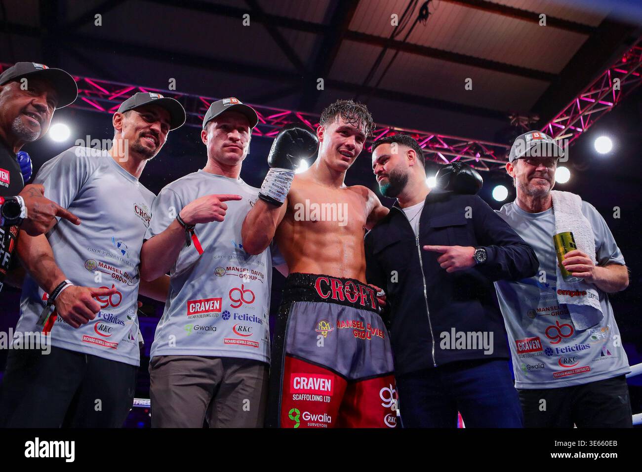 Garan Croft celebrates victory with his team after his fight against ...
