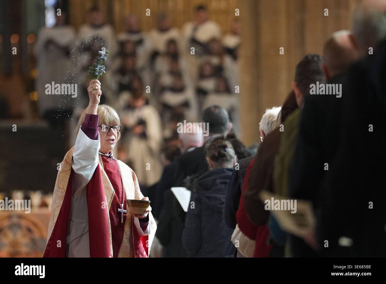 The Archbishop of Canterbury Dame Sarah Mullally sprinkles holy water ...