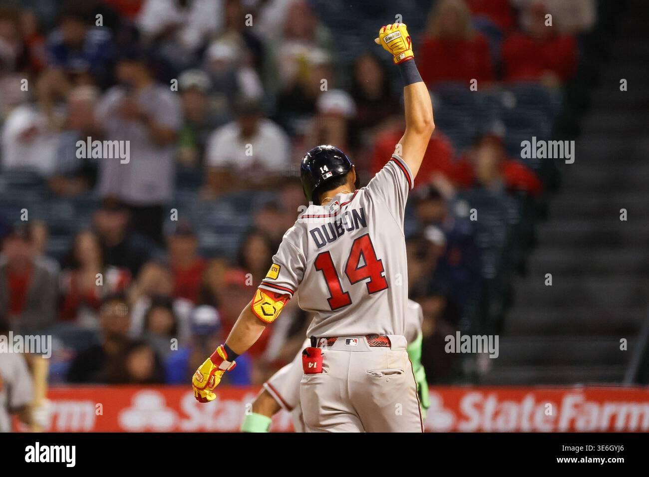Atlanta Braves' Mauricio Dubon (14) reacts after hitting a home run ...