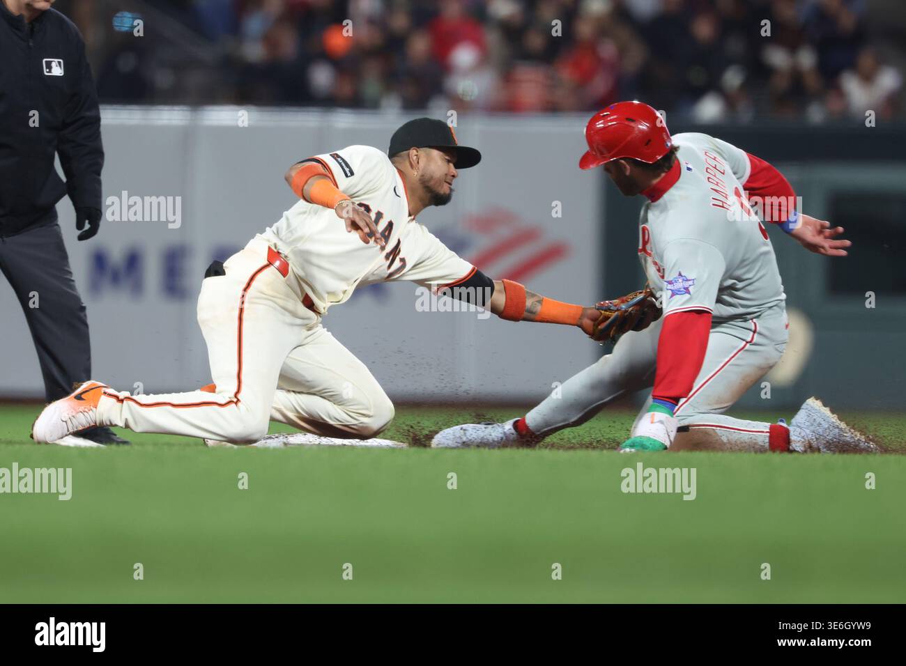 San Francisco Giants' Luis Arraez, left, tags Philadelphia Phillies ...