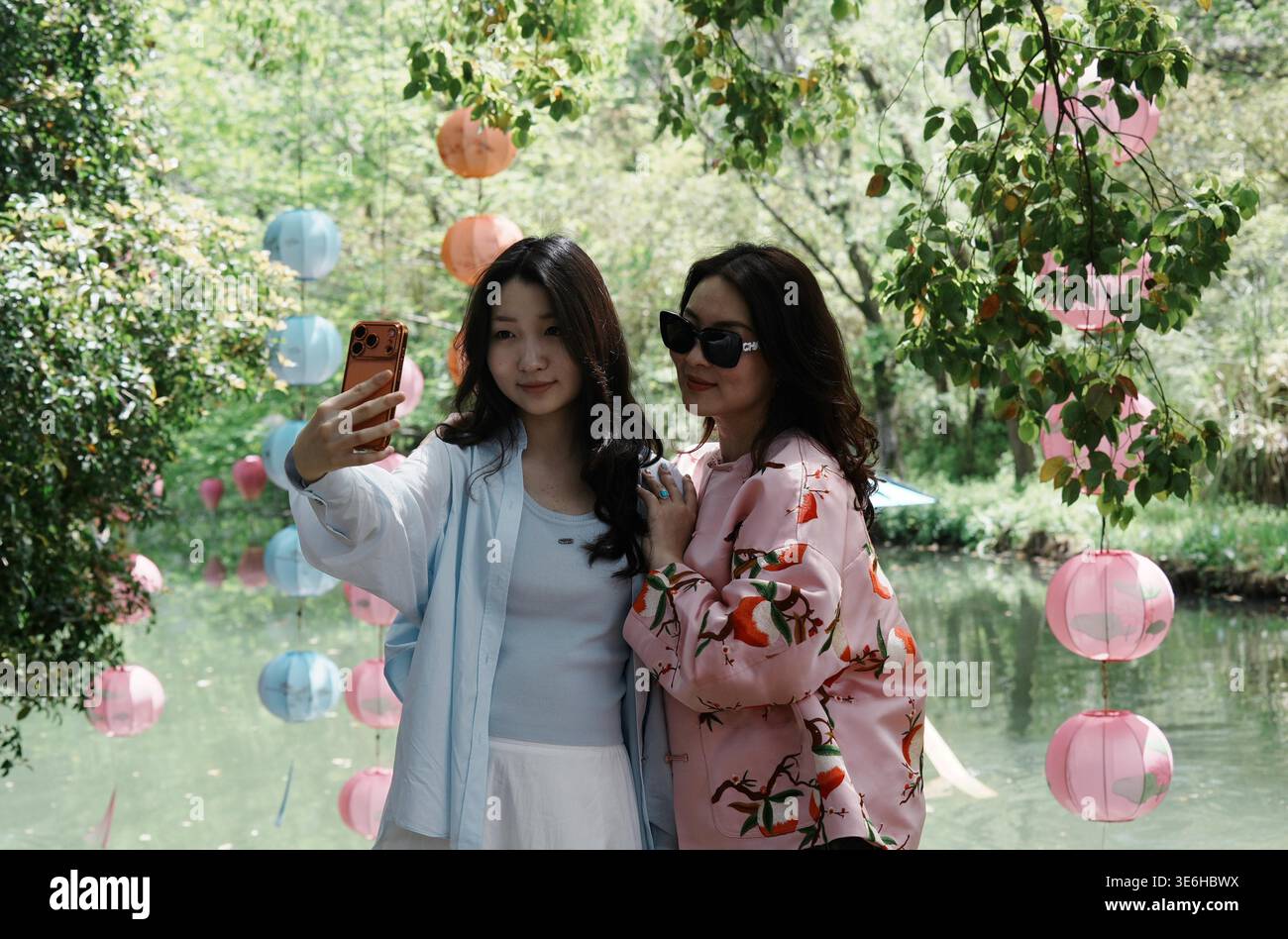 Tourists enjoy spring scenery at Hangzhou Xixi National Wetland Park in ...