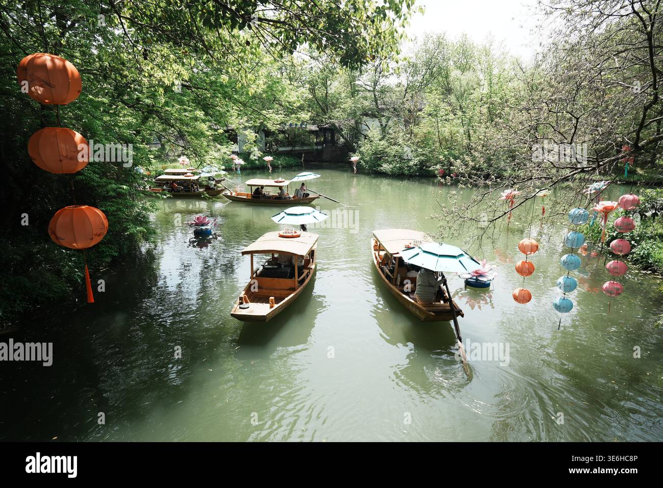Tourists enjoy spring scenery at Hangzhou Xixi National Wetland Park in ...
