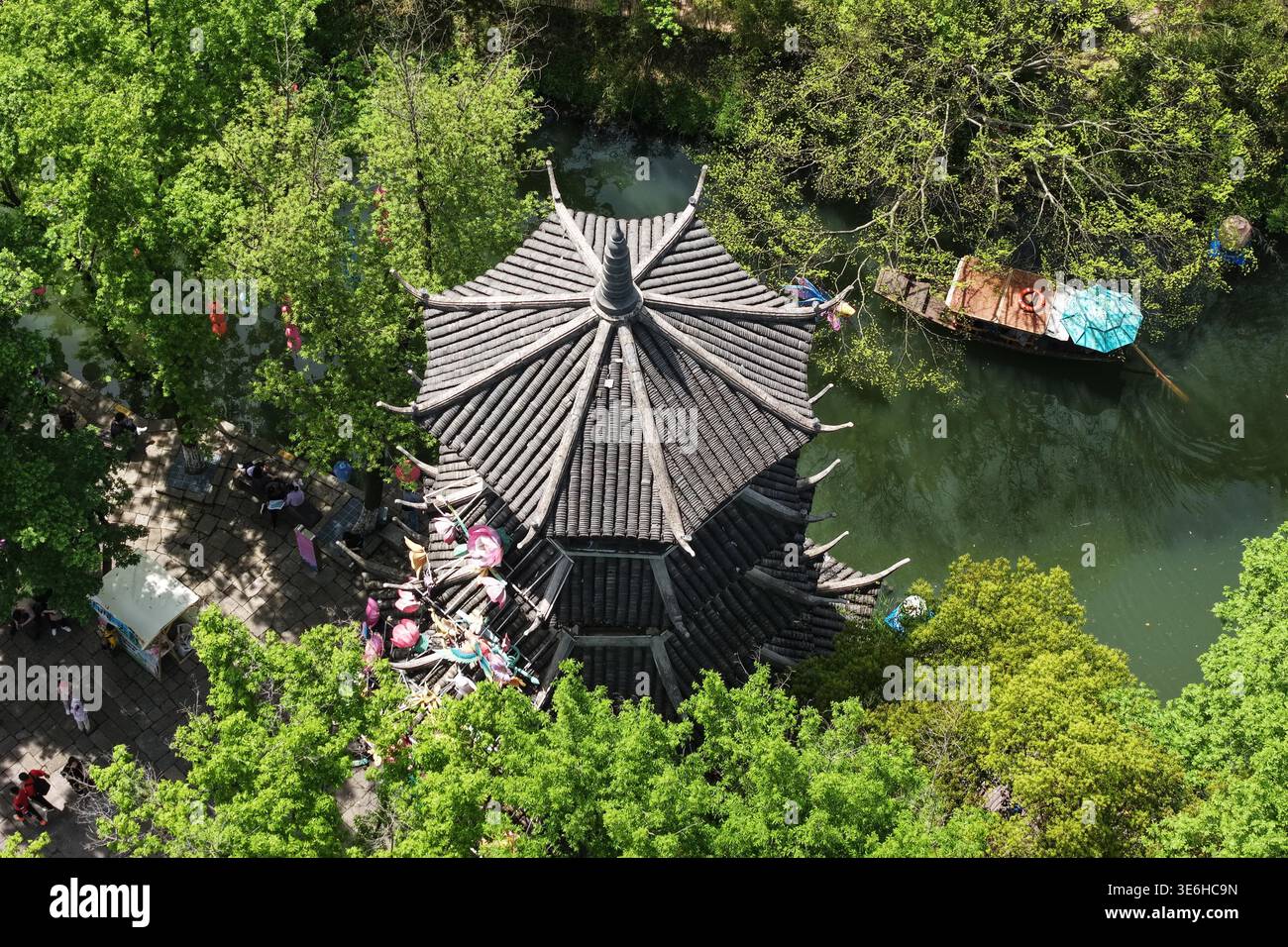 Tourists enjoy spring scenery at Hangzhou Xixi National Wetland Park in ...