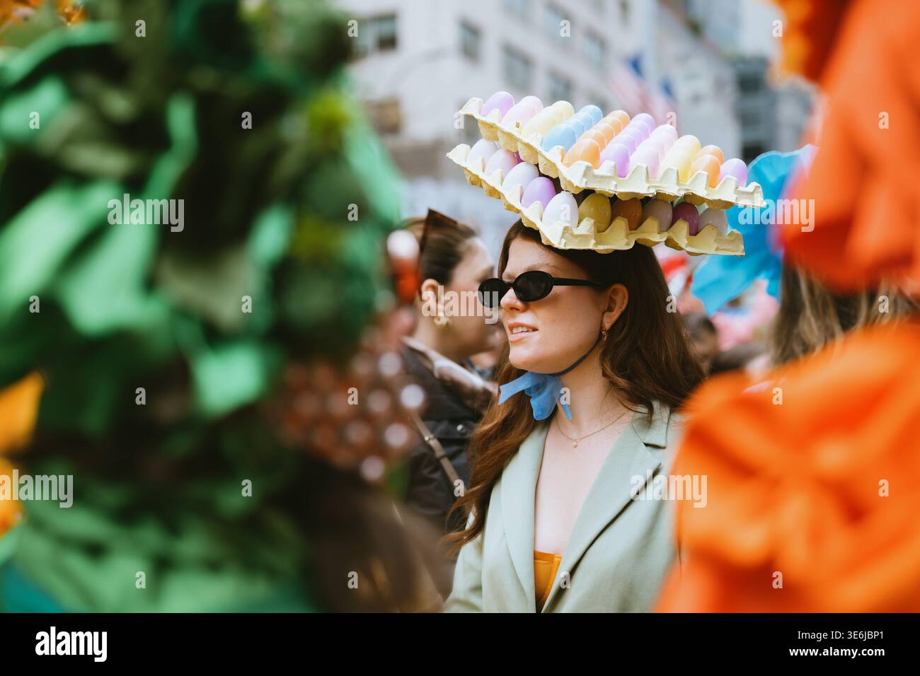 People wear colorful hats while attending the 2026 NYC Easter Parade ...