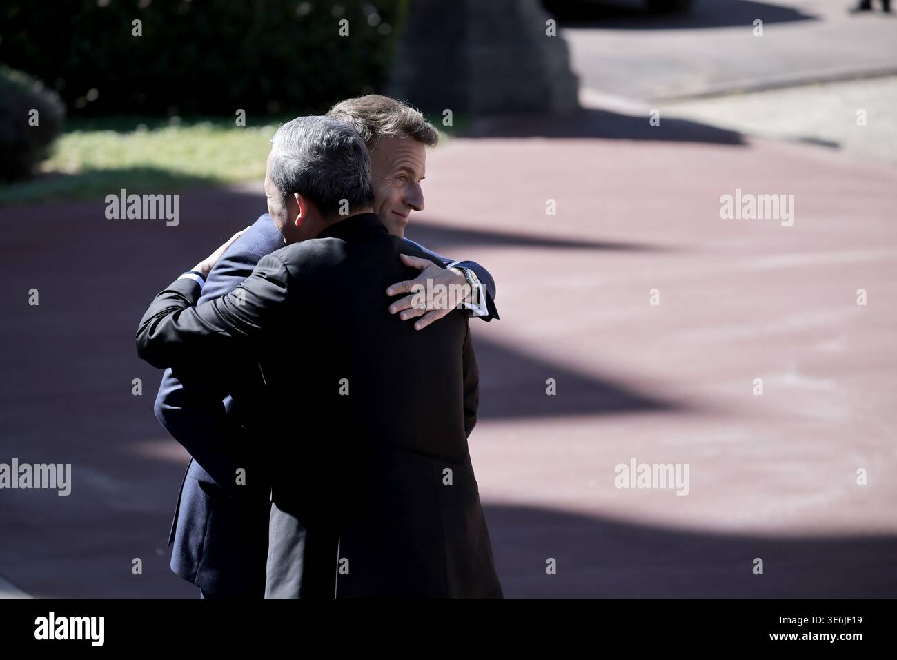 French President Emmanuel Macron, right, welcomes Cambodia's Prime ...