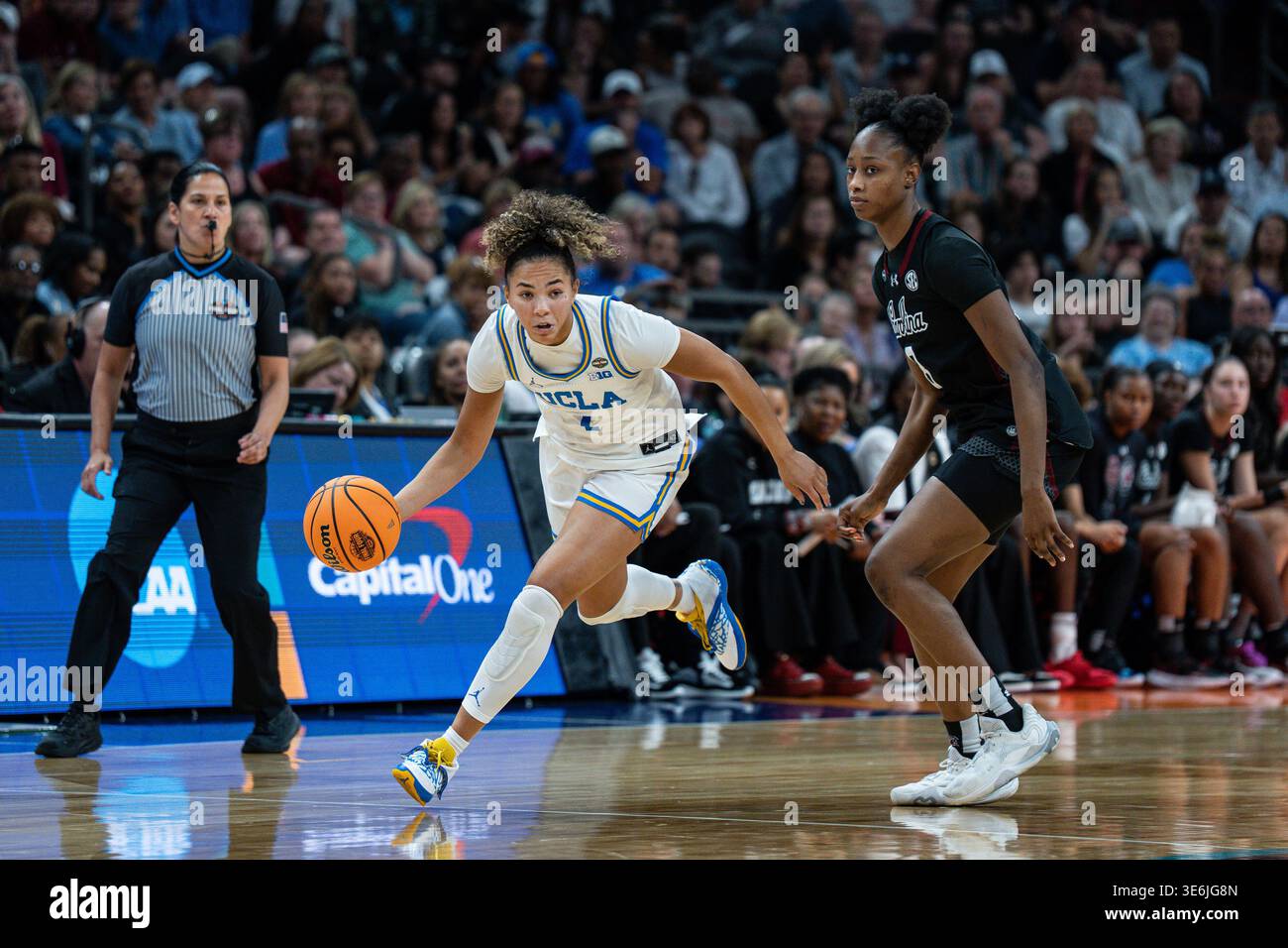 UCLA Bruins guard Kiki Rice (1) is defended by South Carolina Gamecocks ...
