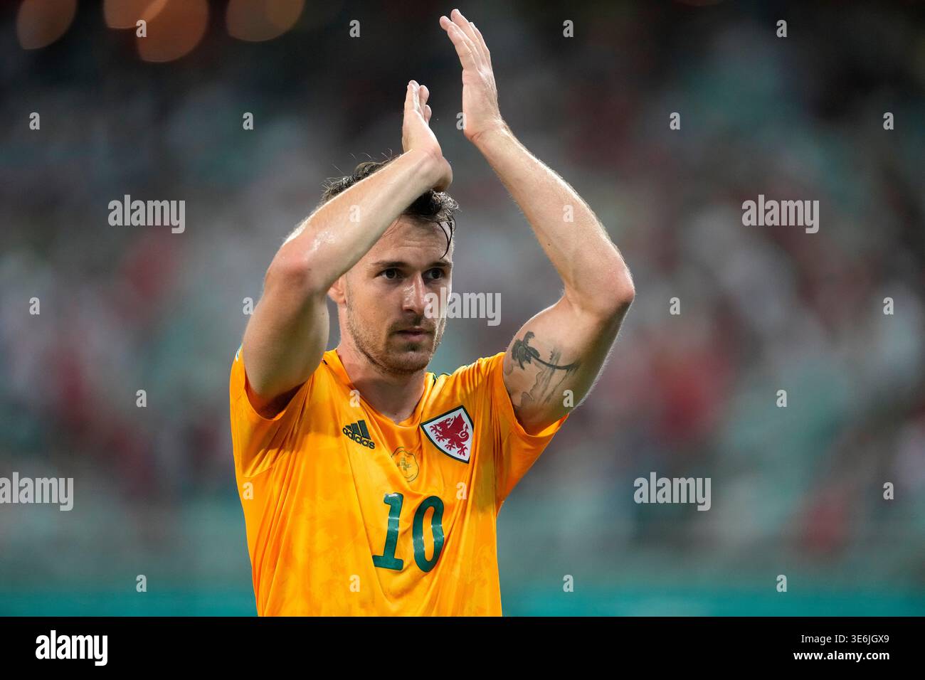 FILE - Wales' Aaron Ramsey addresses spectators during the Euro 2020 ...