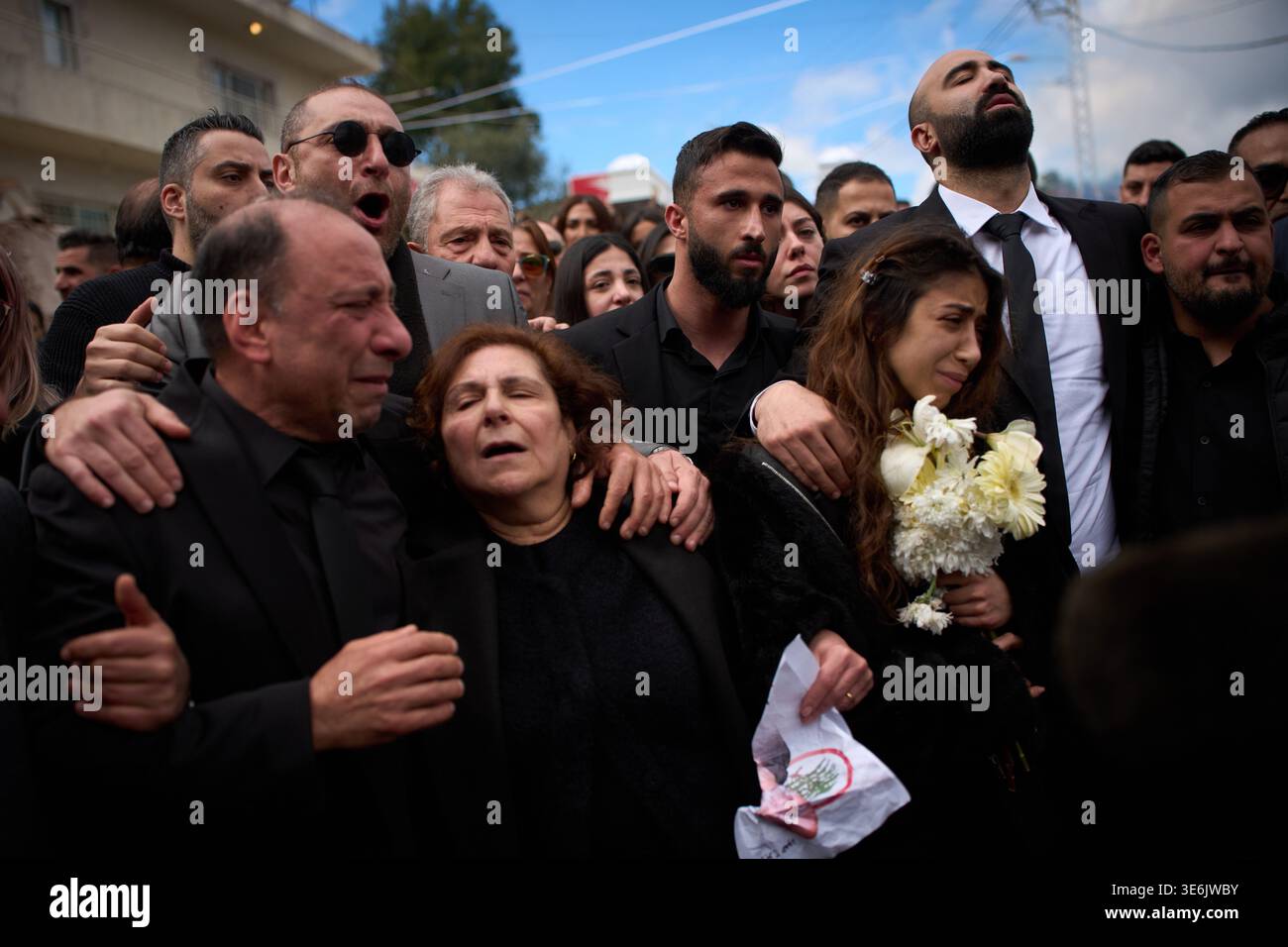 Gyal, right, daughter of Pierre Mouawad, an official with the anti ...