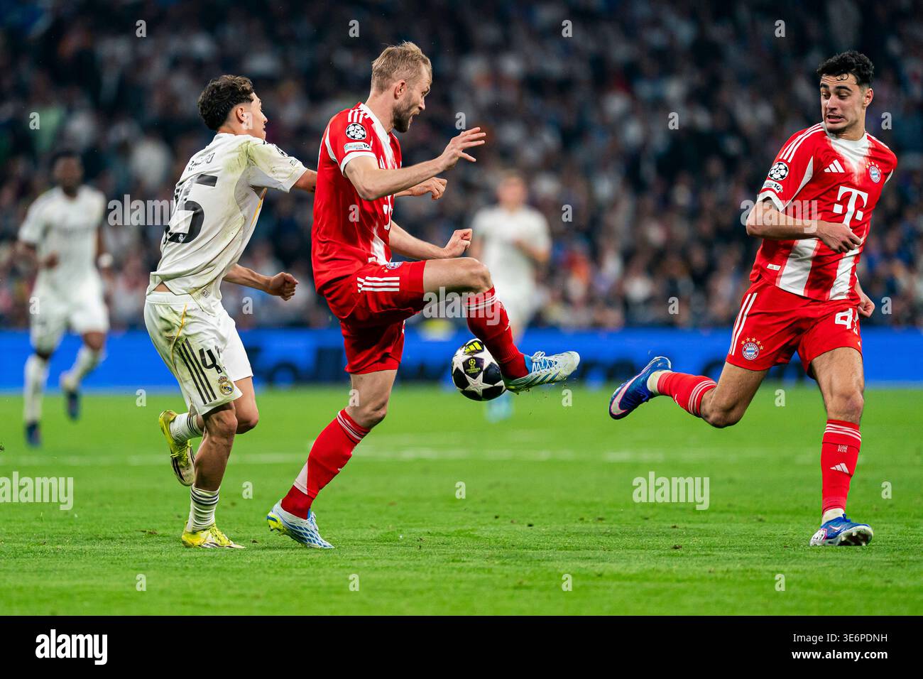 Real Madrid CF's Thiago Pitarch and Bayern Munchen’s Josip Stanisic ...