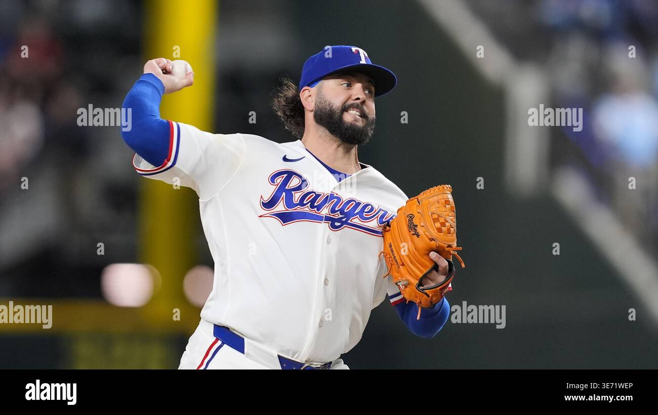 Texas Rangers pitcher Jakob Junis throws to the Seattle Mariners in a ...