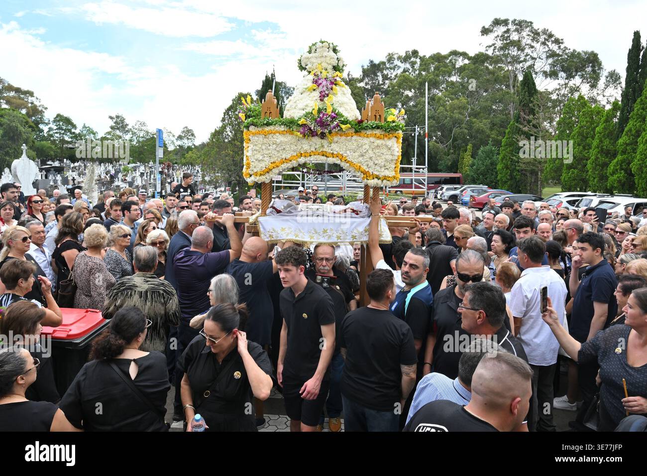 Worshippers walk under the Epitaphio (the symbolic funeral bier of ...
