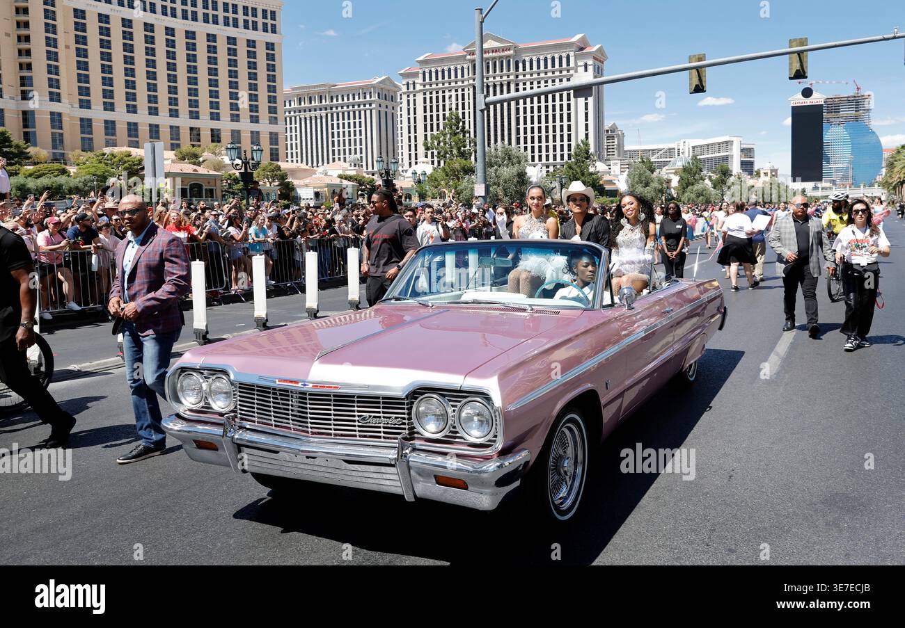 Bruno Mars, center, rides in a parade on the Las Vegas Strip Friday ...