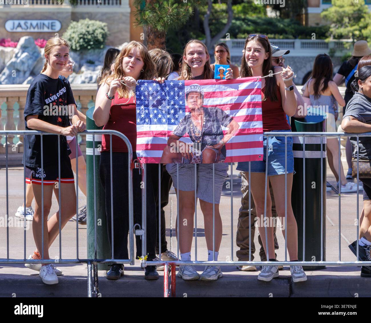 Attendees at the Bruno Mars Day Parade in front of the Bellagio on the ...