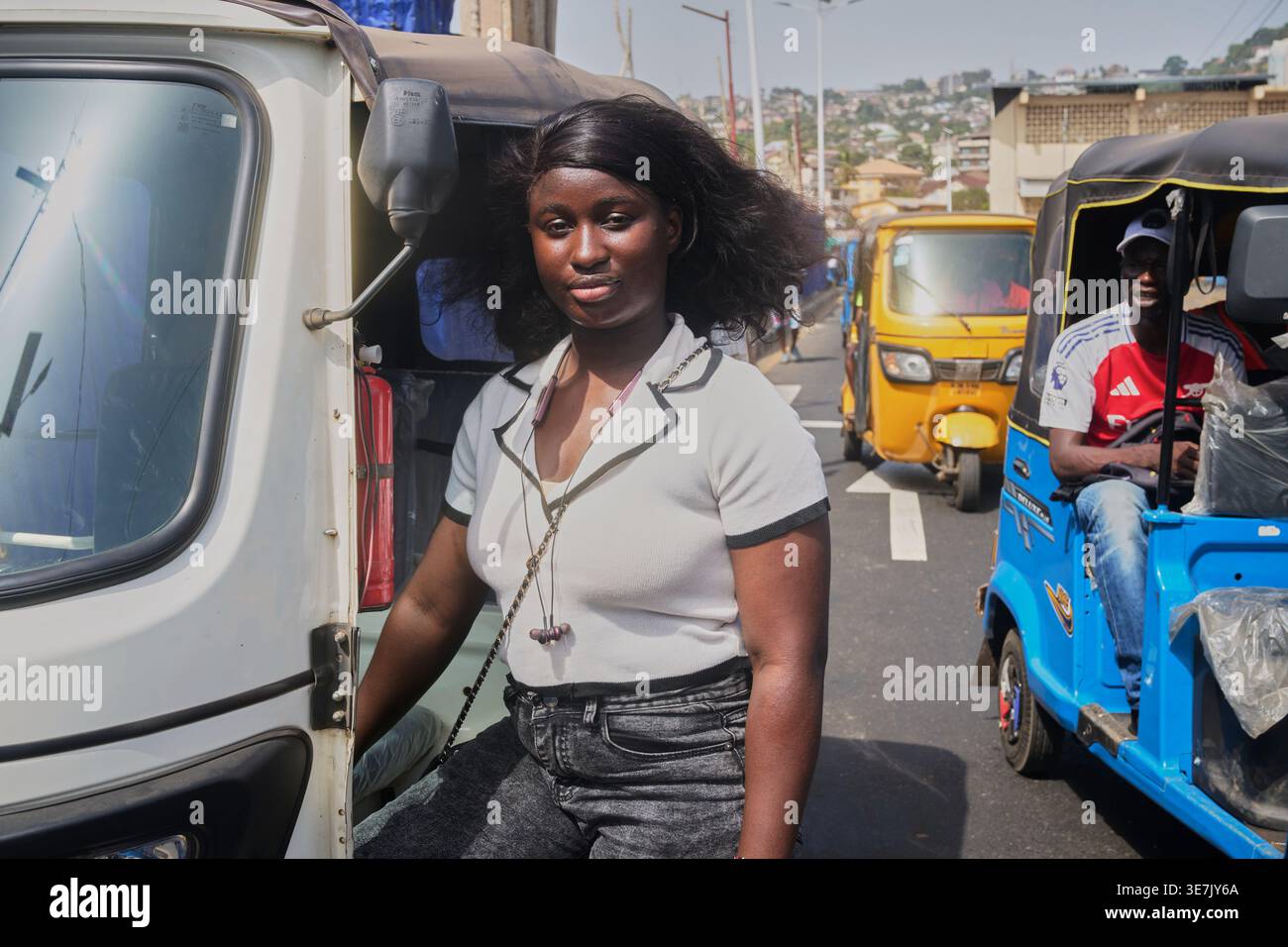 Halimatu Kamara, a rickshaw driver poses for a portrait in Freetown ...