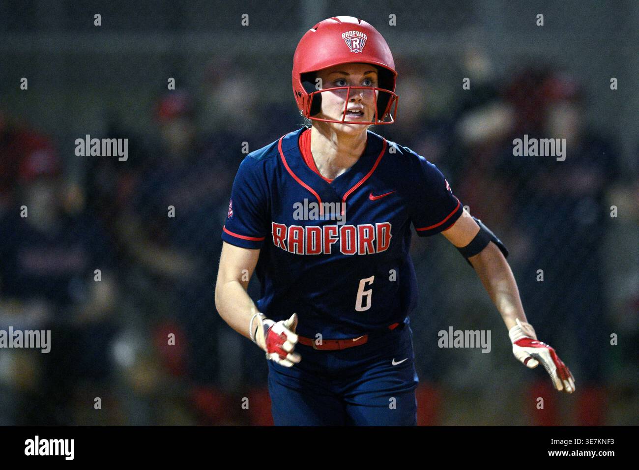 Radford's Rachel Smith (6) runs after hitting a pitch during an NCAA ...