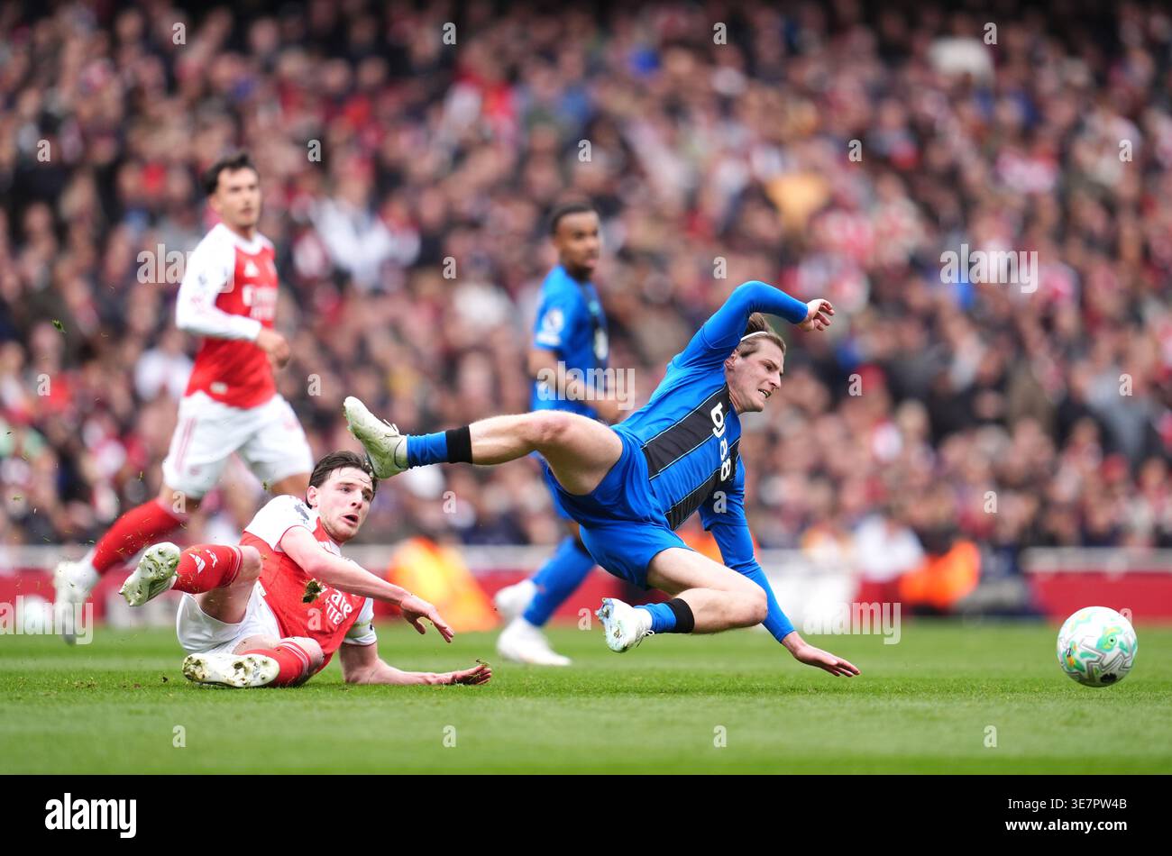 Arsenal's Declan Rice (left) challenges Bournemouth's Alex Scott during ...