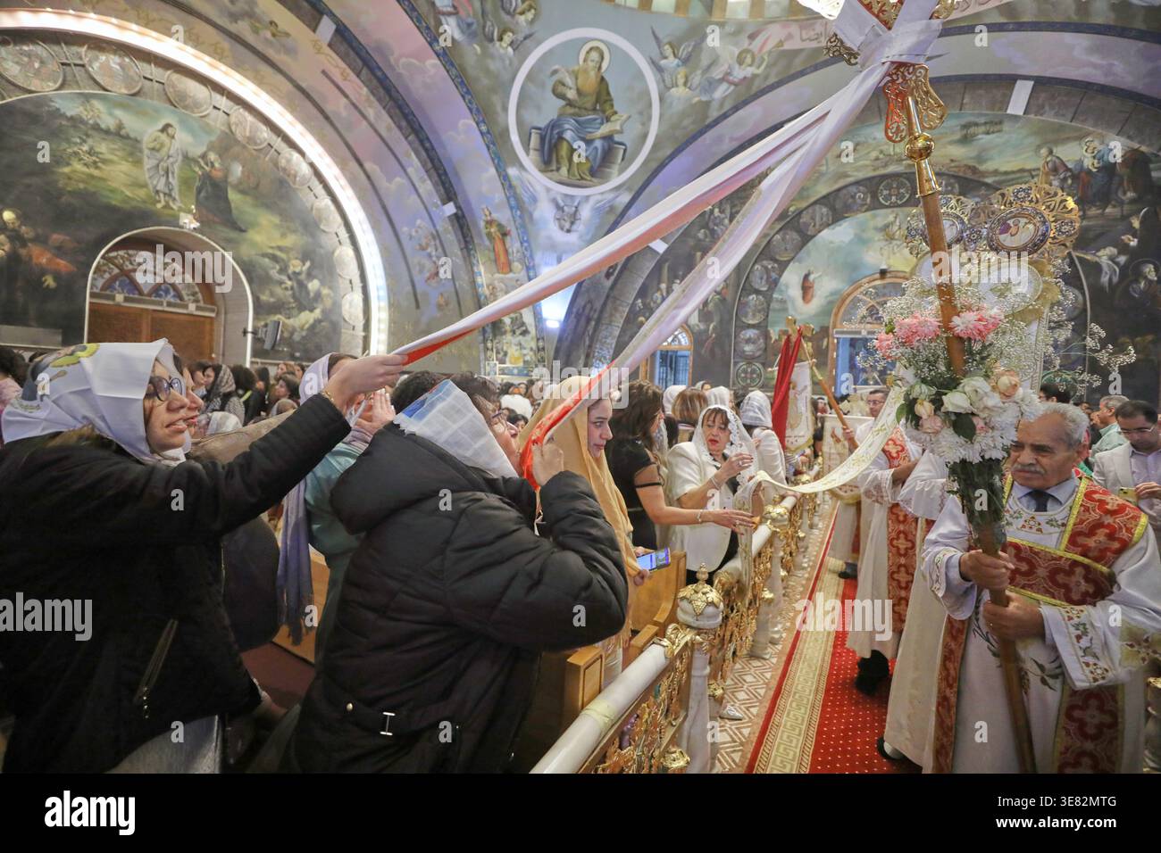 Coptic Christians attend a resurrection Mass at Archangel Michael ...