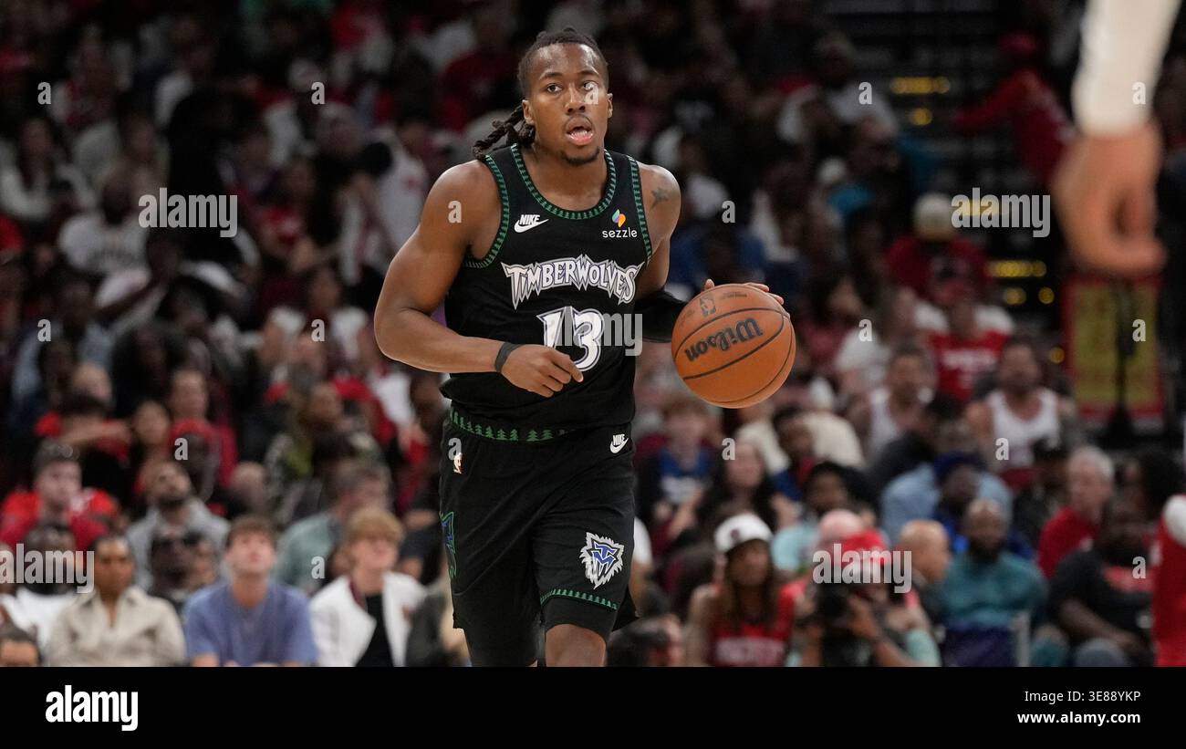 Minnesota Timberwolves guard Ayo Dosunmu (13) controls the ball against ...