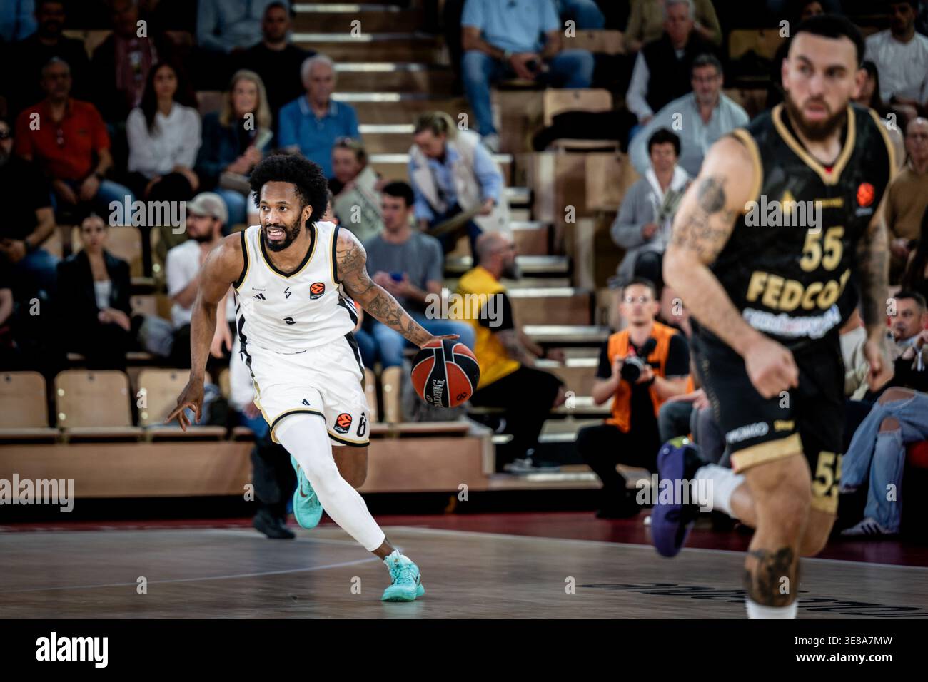 #6 Braian Angola of LDLC Asvel Lyon Villeurbane in action with #55 Mike ...