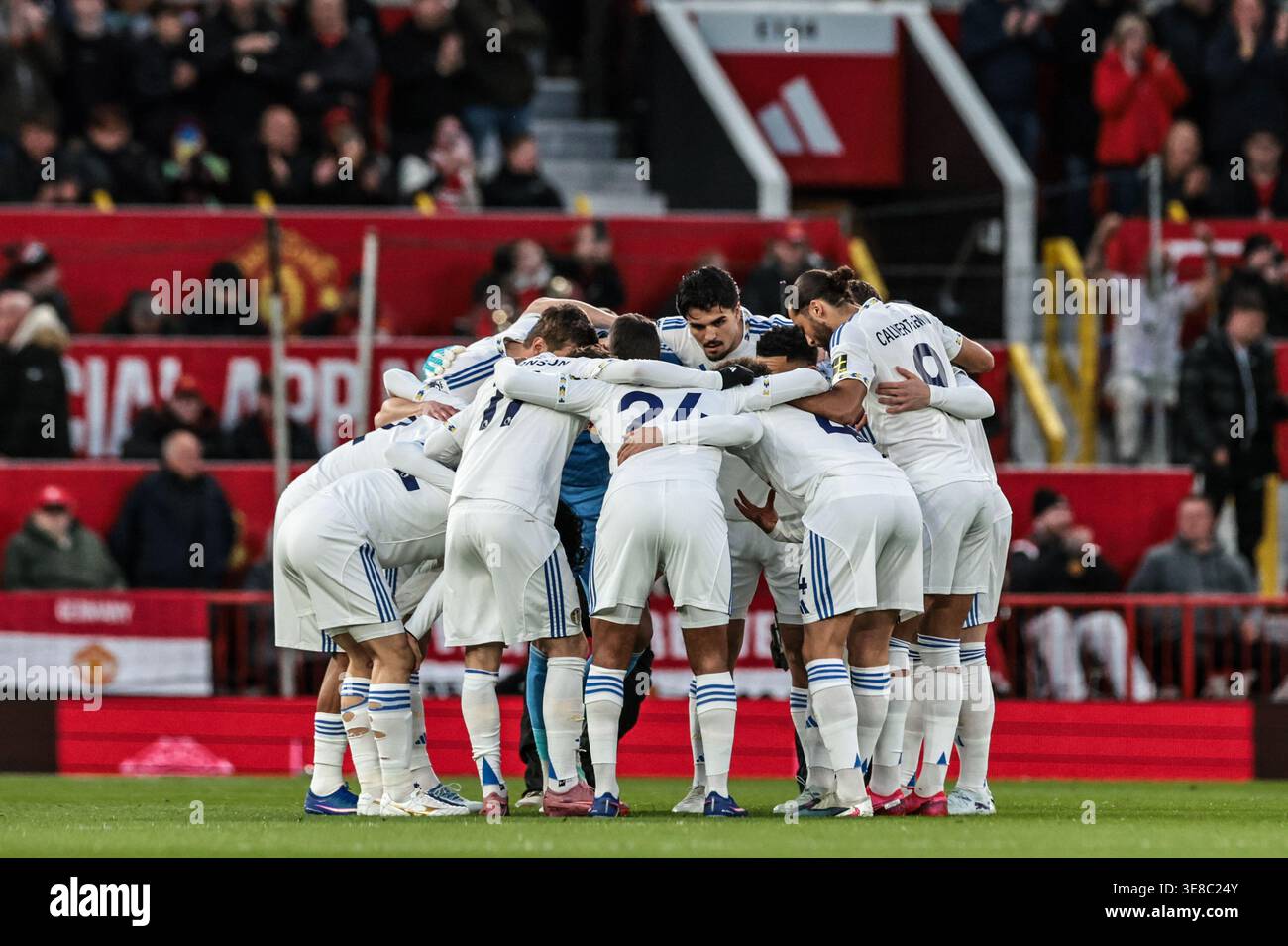 Leeds United team huddle during the Premier League match Manchester ...
