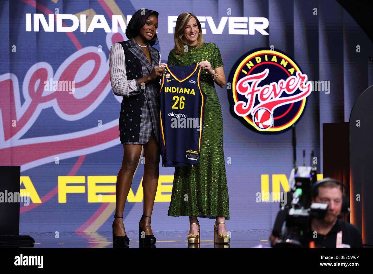 South Carolina guard Raven Johnson poses with WNBA commissioner Cathy ...