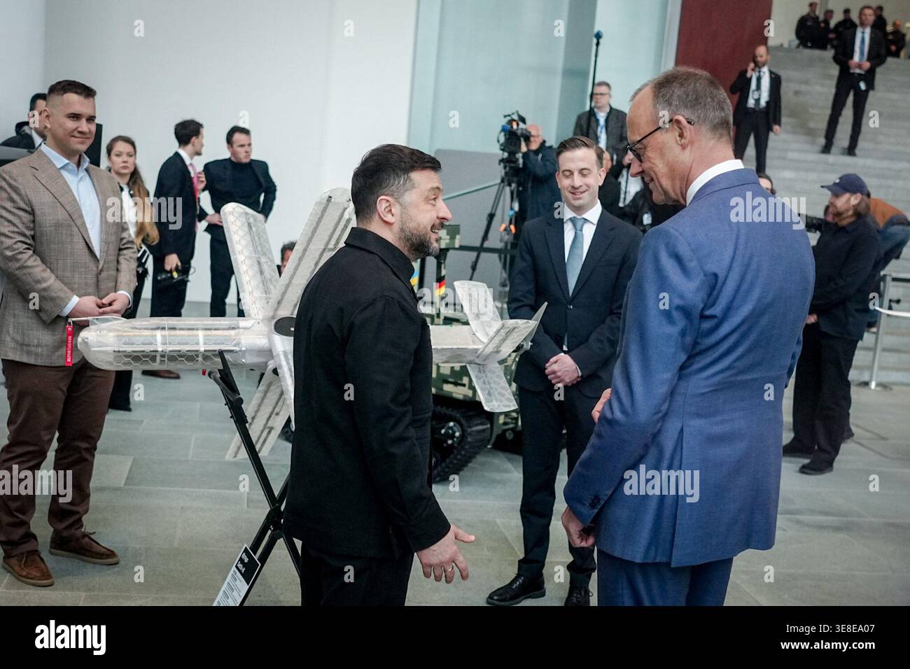 14 April 2026, Berlin: Federal Chancellor Friedrich Merz (CDU, r) and ...