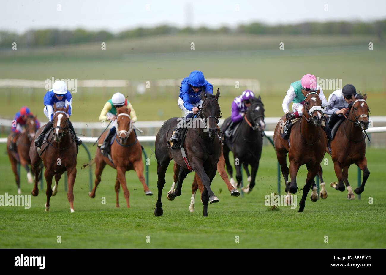 Cerro Blanco ridden by William Buick (centre) coming home to win the ...