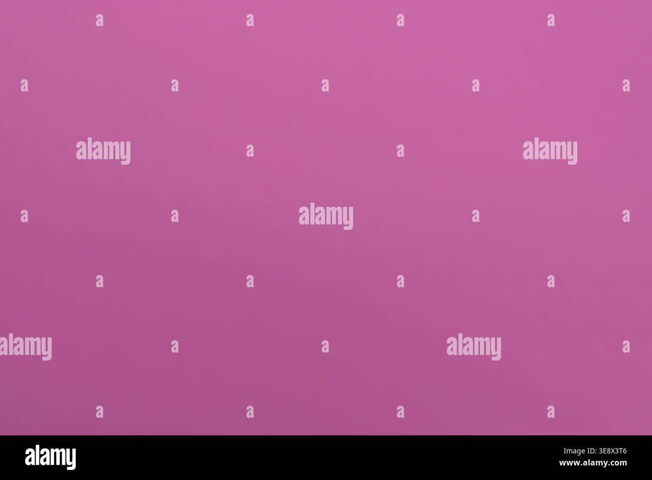 Defocused pink textile surface creating smooth abstract background for ...