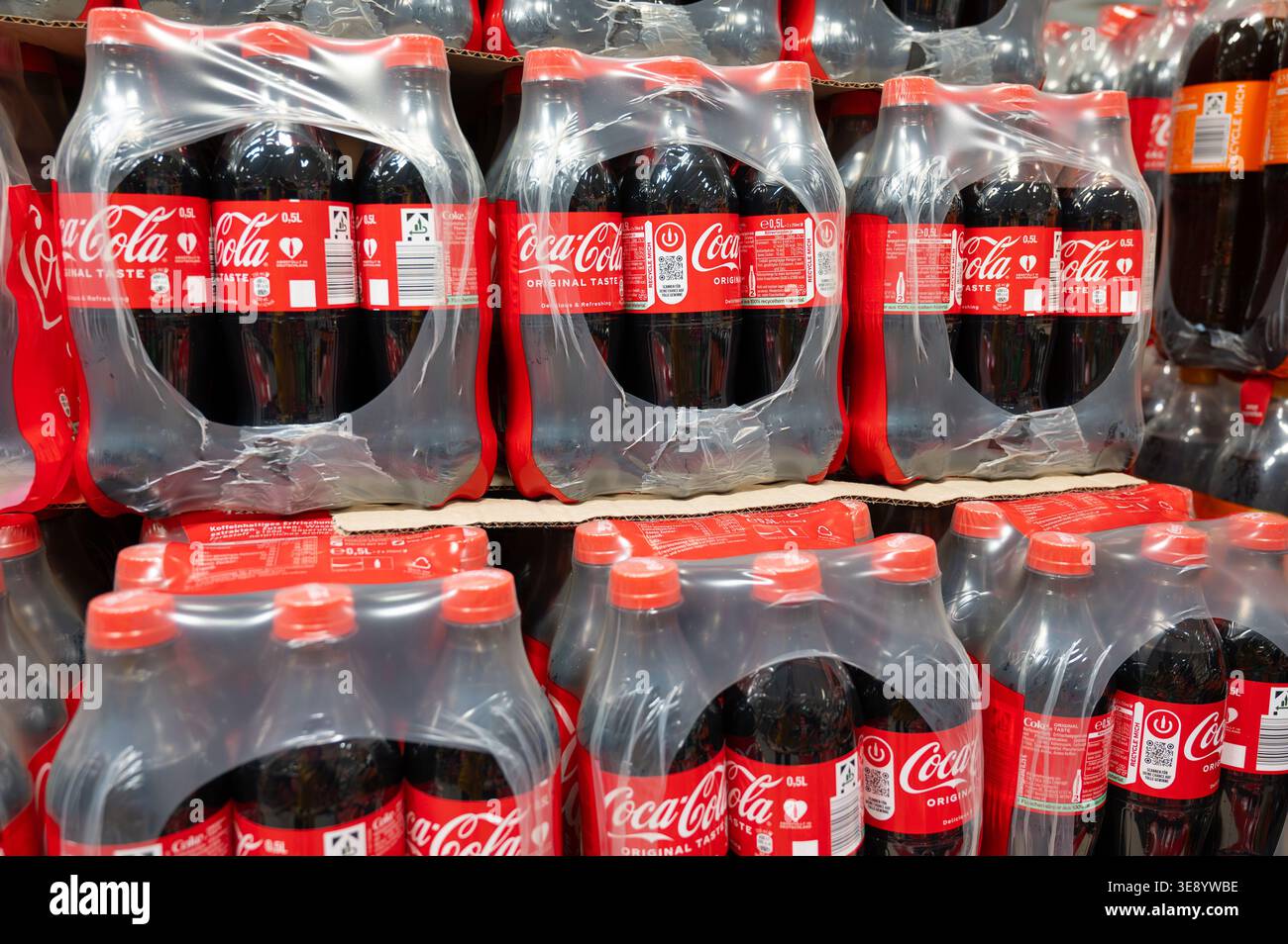 Coca cola soft drinks assortment, deposit bottles in crates ...