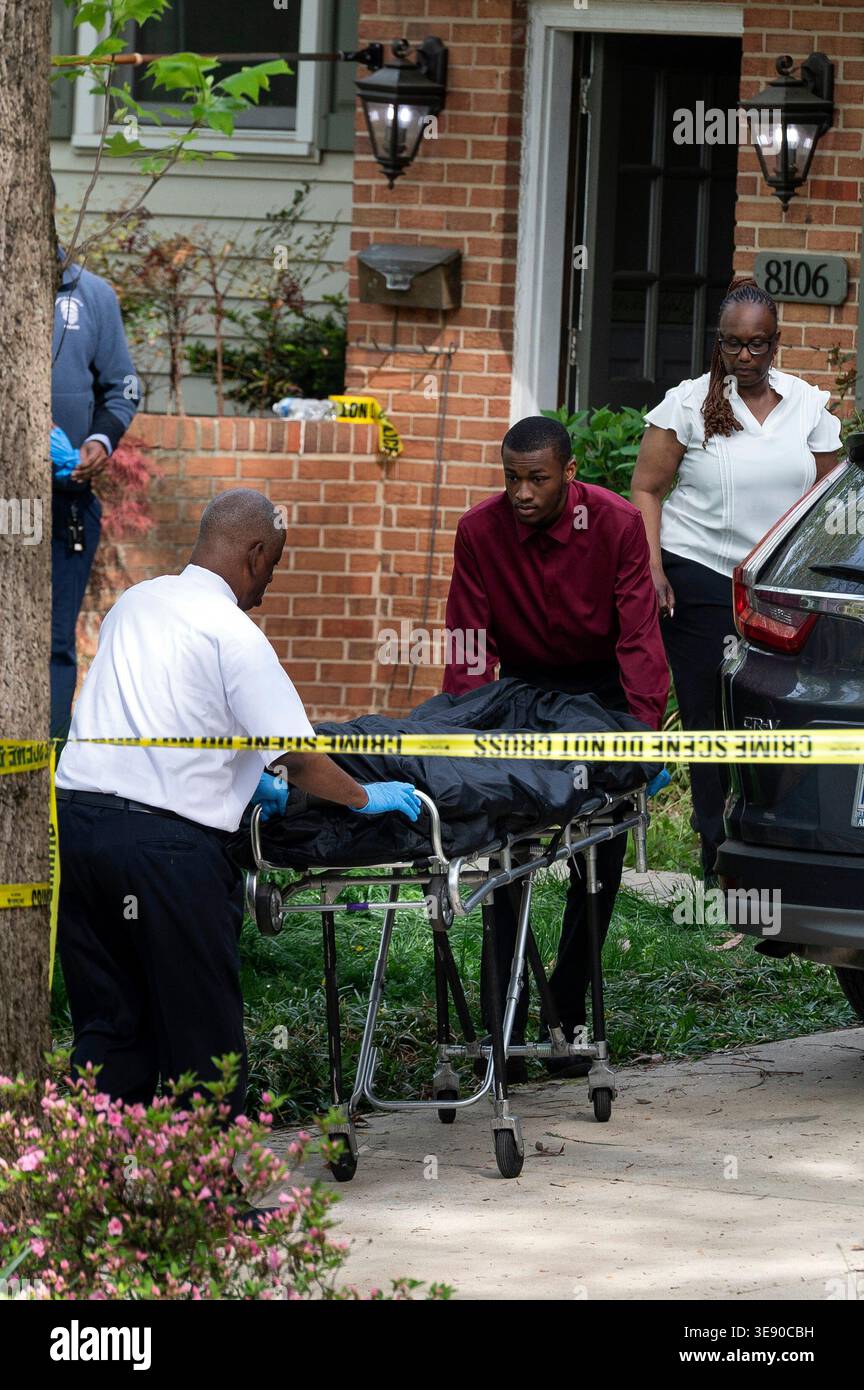 Fairfax County coroners remove a body from the home of former Virginia ...