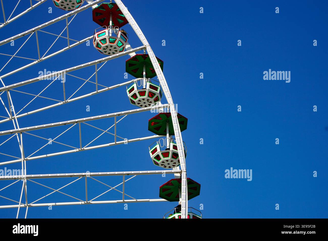 Fairground ferris wheel cabins with minimal composition and copy hi-res ...