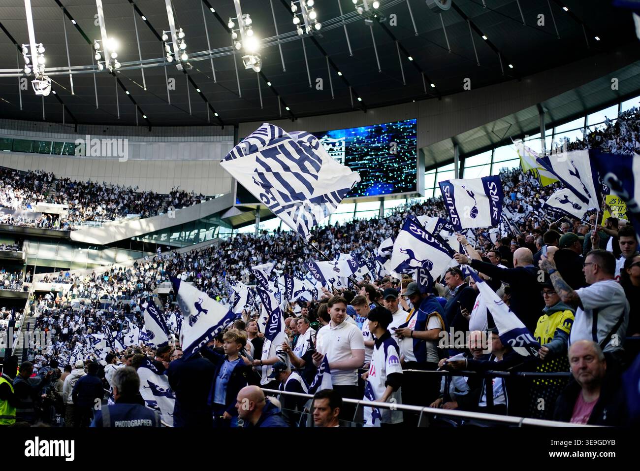 Tottenham Hotspur fans waving flags in the stands before the Premier ...